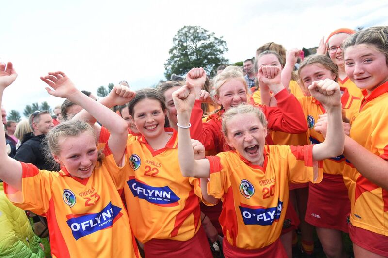 Éire Óg celebrate a famous Féile double