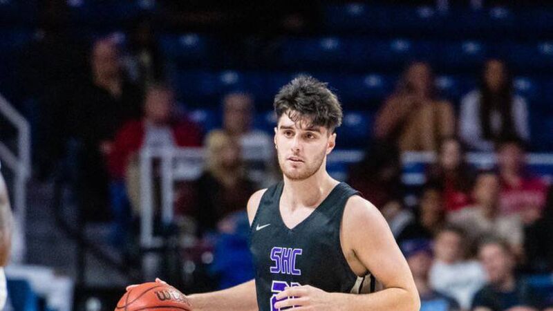 Tall man Eli Lenihan is determined to reach for even greater heights in ...