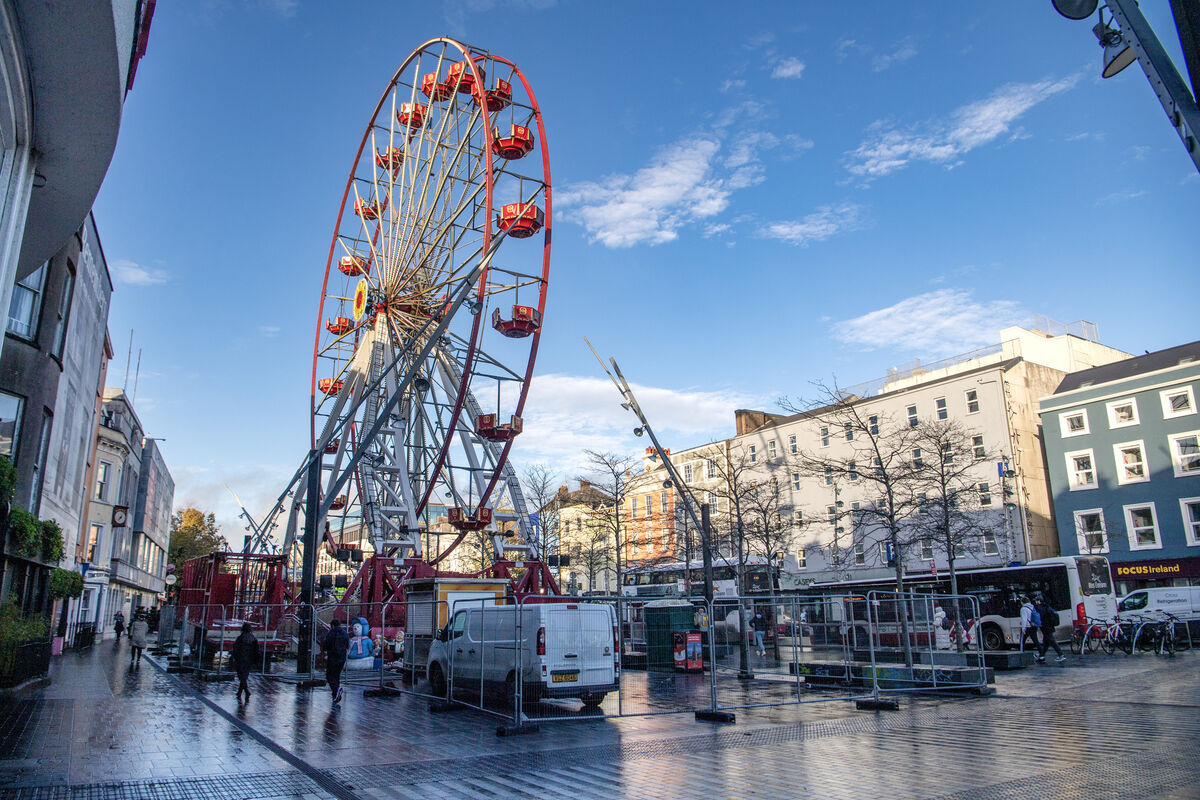 Pics: Cork's Christmas creeps closer as Ferris Wheel is assembled in ...